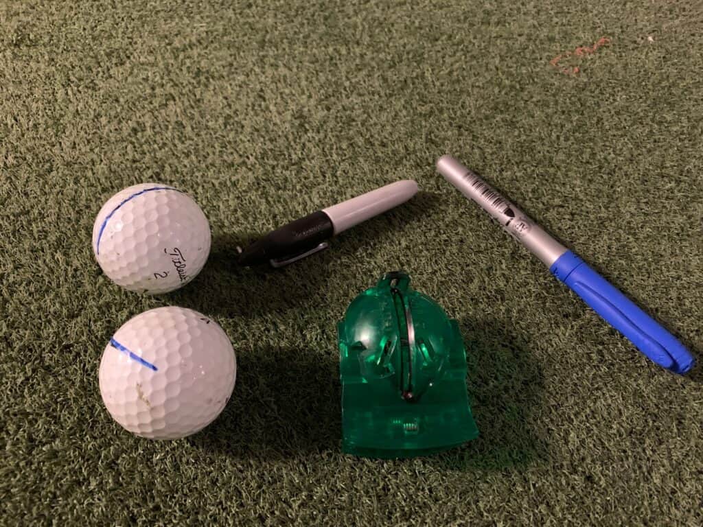 Why Do Golfers Draw A Line On The Ball? - Golf Journey 365